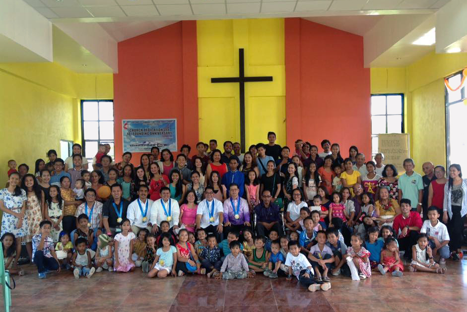 Church rises from the wreckage of typhoon